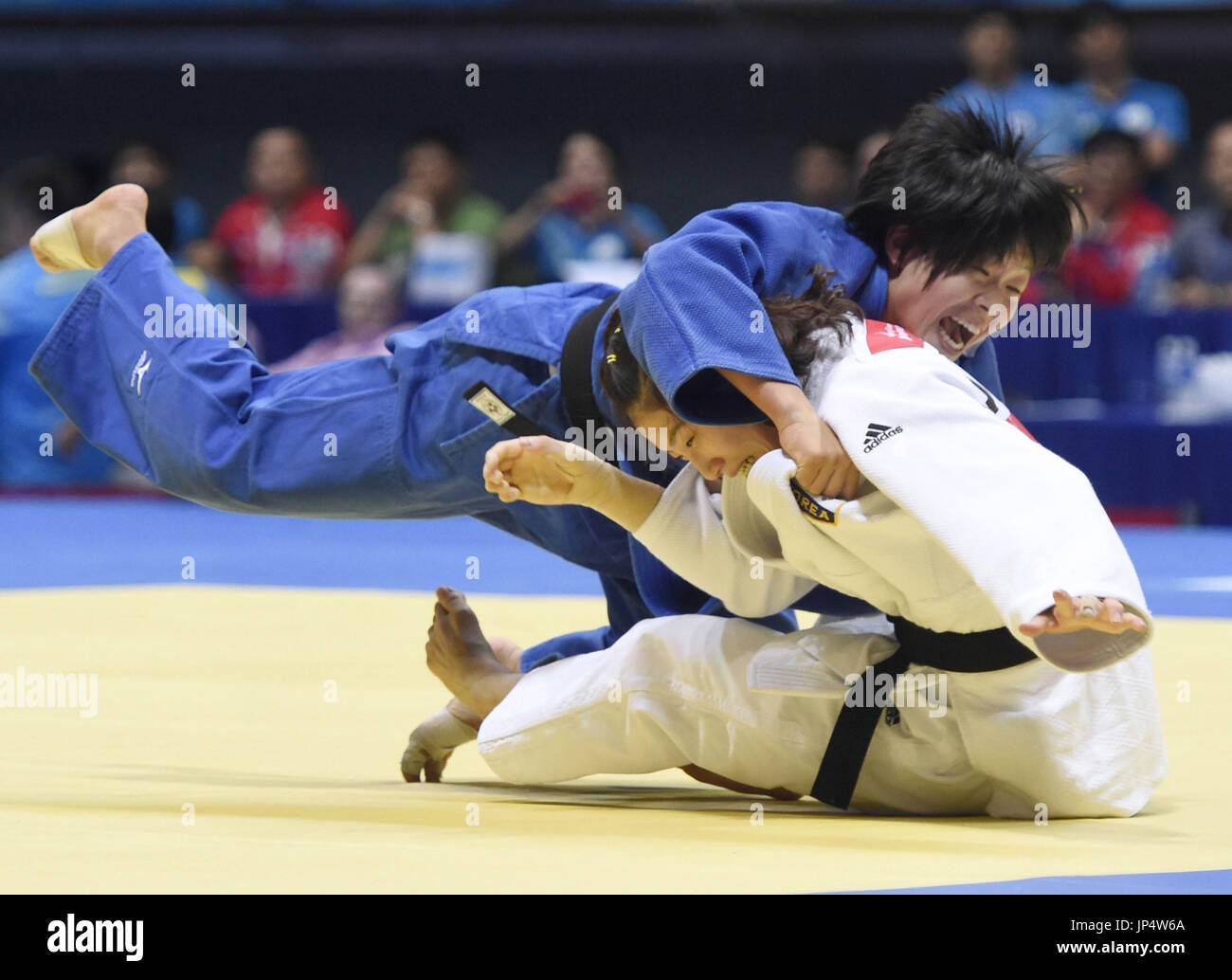 INCHEON, South Korea - Anzu Yamamoto of Japan overpowers Kim Jan Di of ...