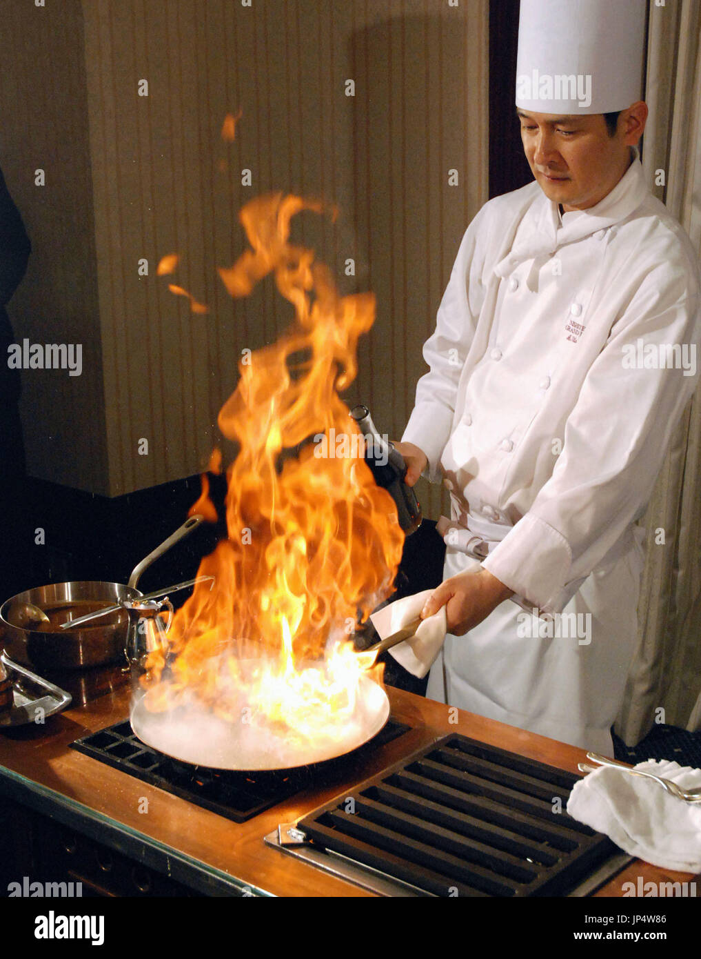 FUKUOKA, Japan - A chef cooks "supreme" curried rice priced at 10,000 ...