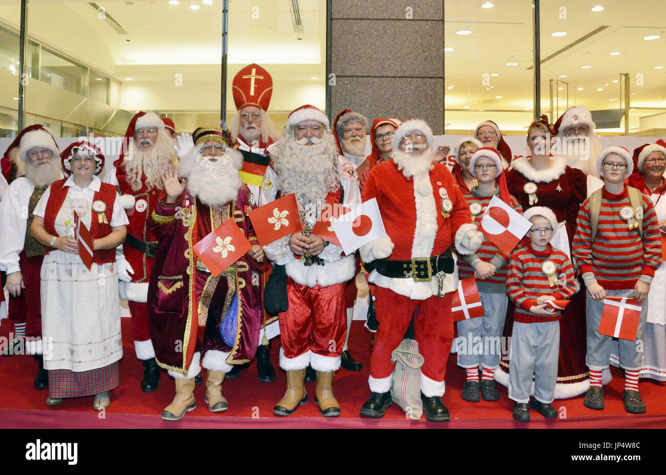 KUMAMOTO, Japan - Eighteen Santa Clauses from around the world ...