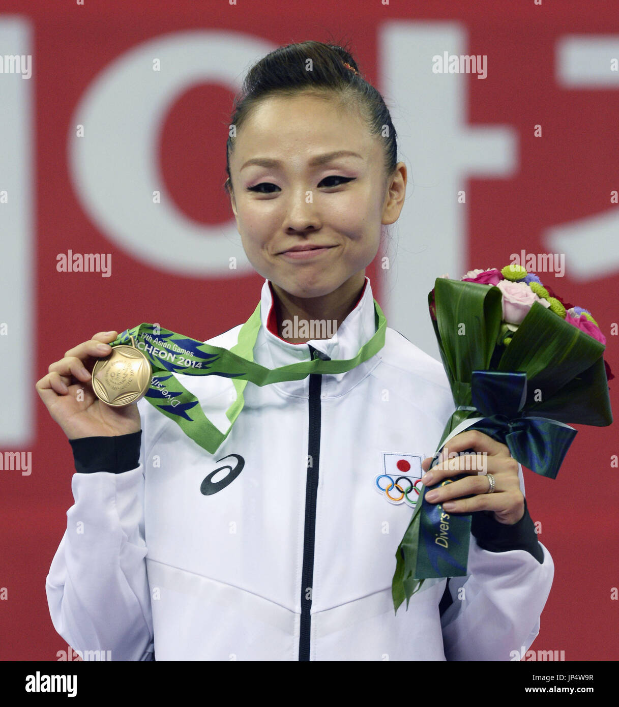 INCHEON, South Korea - Japan's Ai Uchida shows off her bronze medal in ...