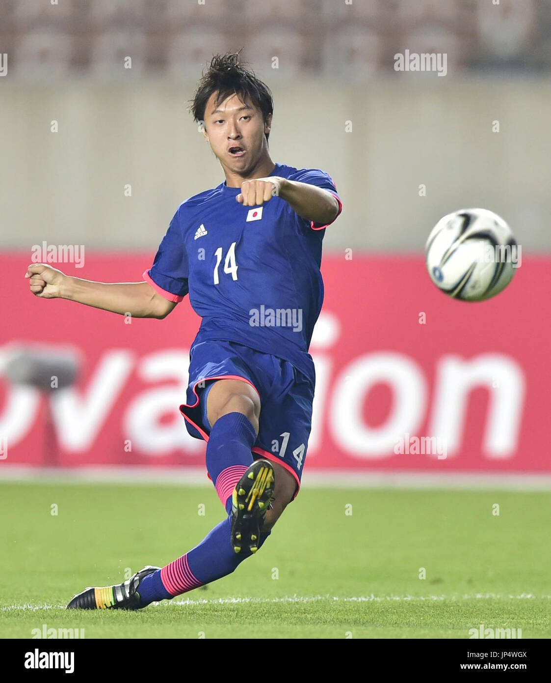 HWASEONG, South Korea - Japan's Takuma Arano scores his side's third goal during the second half ...