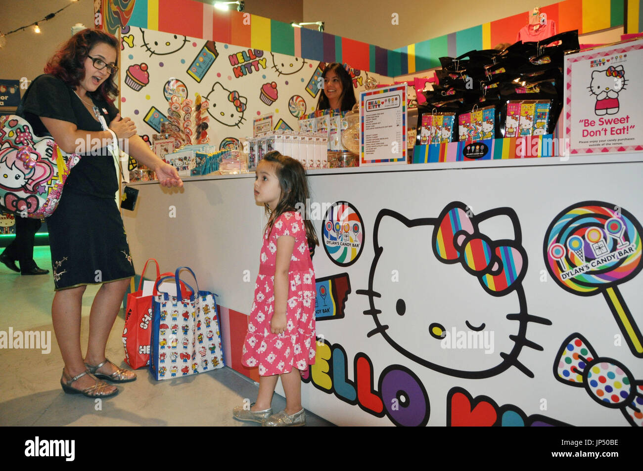 LOS ANGELES, United States - A mother and her daughter visit the first ...