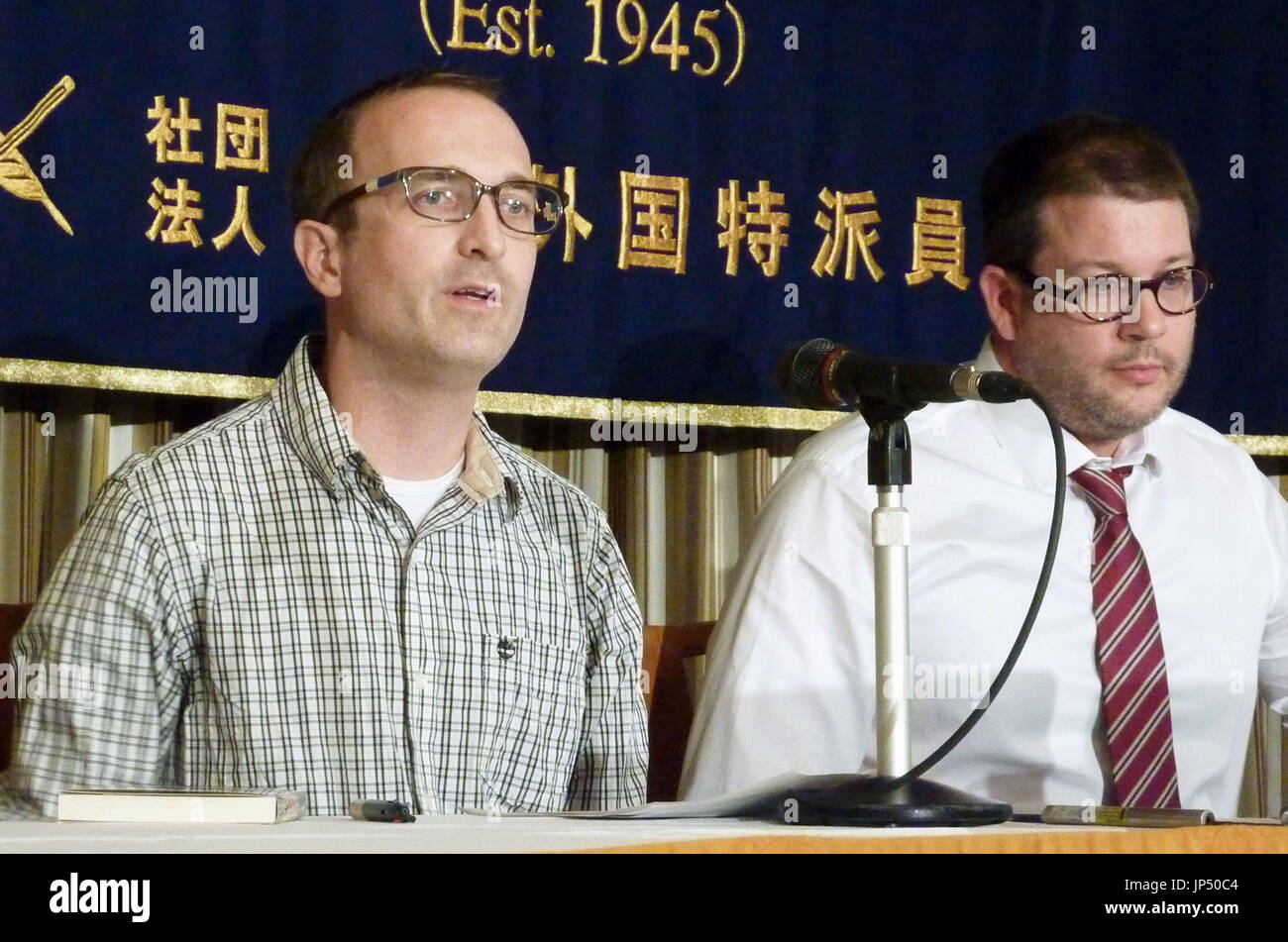 TOKYO, Japan - Jon Mitchell (L), a journalist who has been researching ...