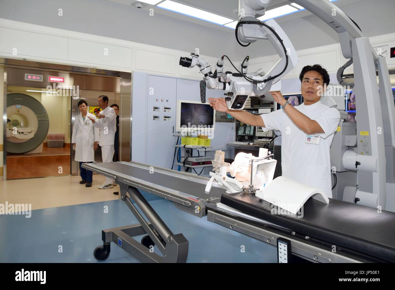 KYOTO, Japan - The Kyoto University Hospital displays an operating ...
