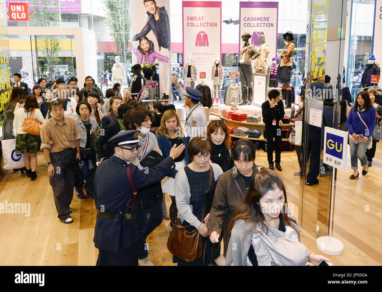 OSAKA, Japan - Customers queue in the second Osaka flagship store of ...