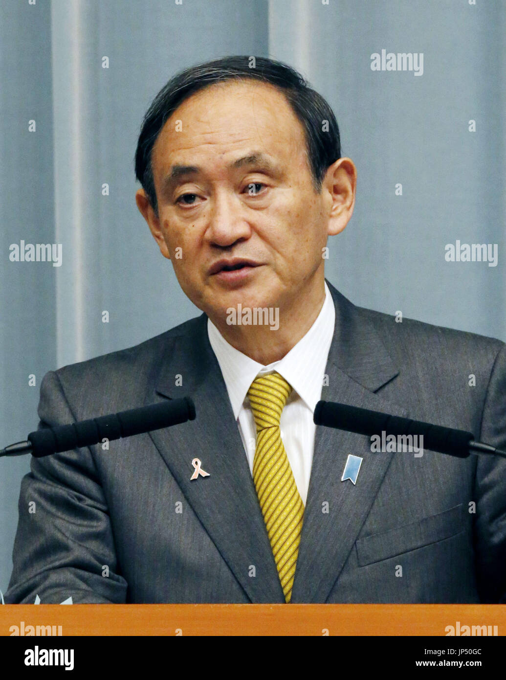 TOKYO, Japan - Chief Cabinet Secretary Yoshihide Suga attends a press ...