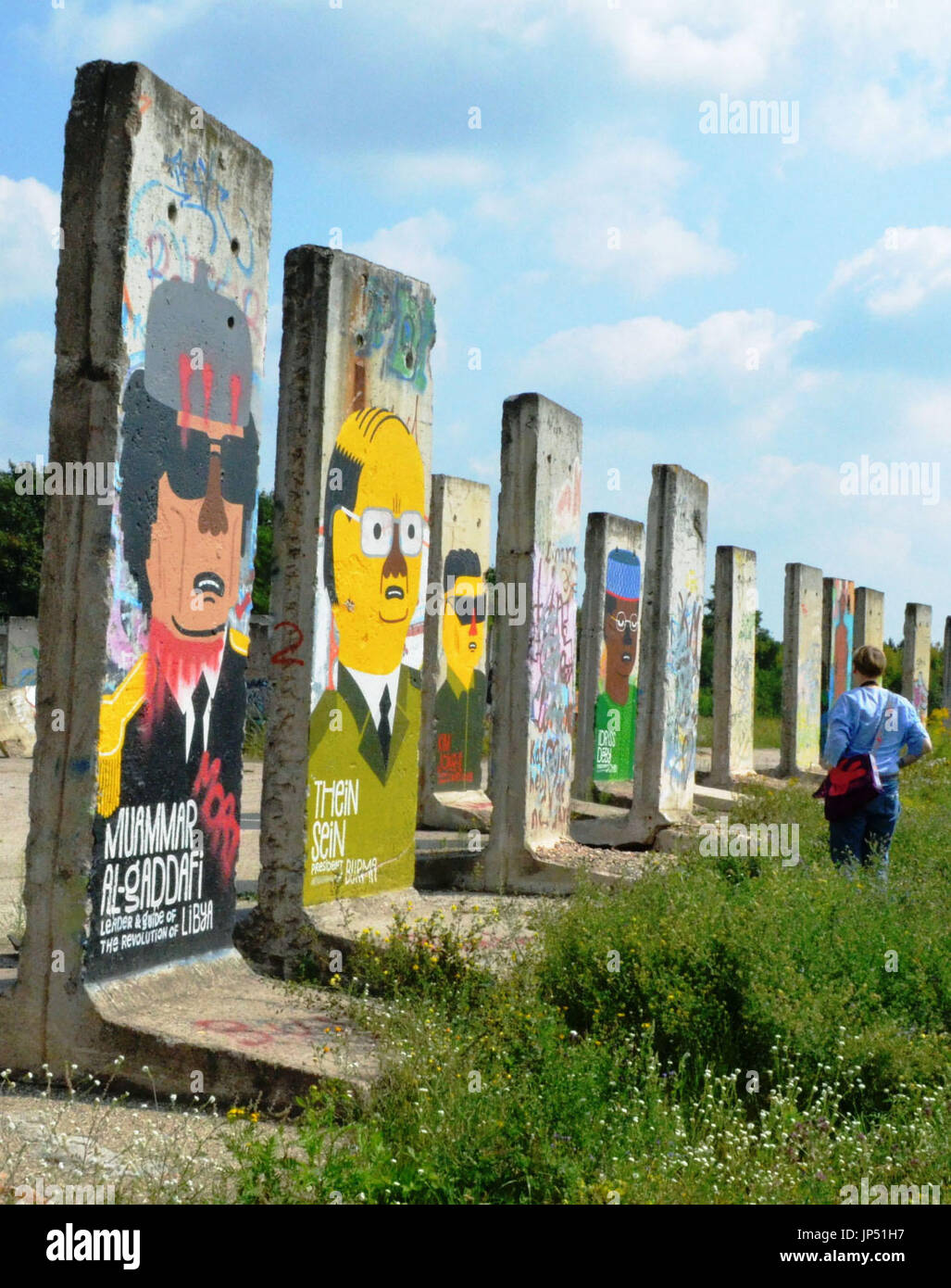BERLIN, Germany - Pieces of the Berlin Wall on which pictures of ...