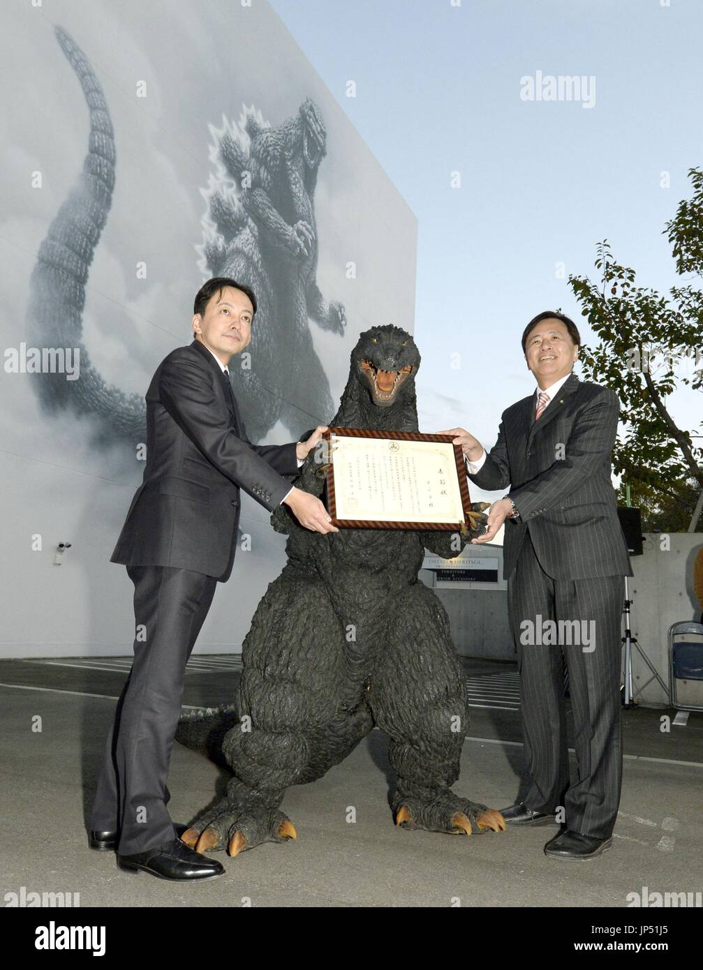 TOKYO, Japan - Tokyo's Setagaya Ward Mayor Nobuto Hosaka (R) presents ...