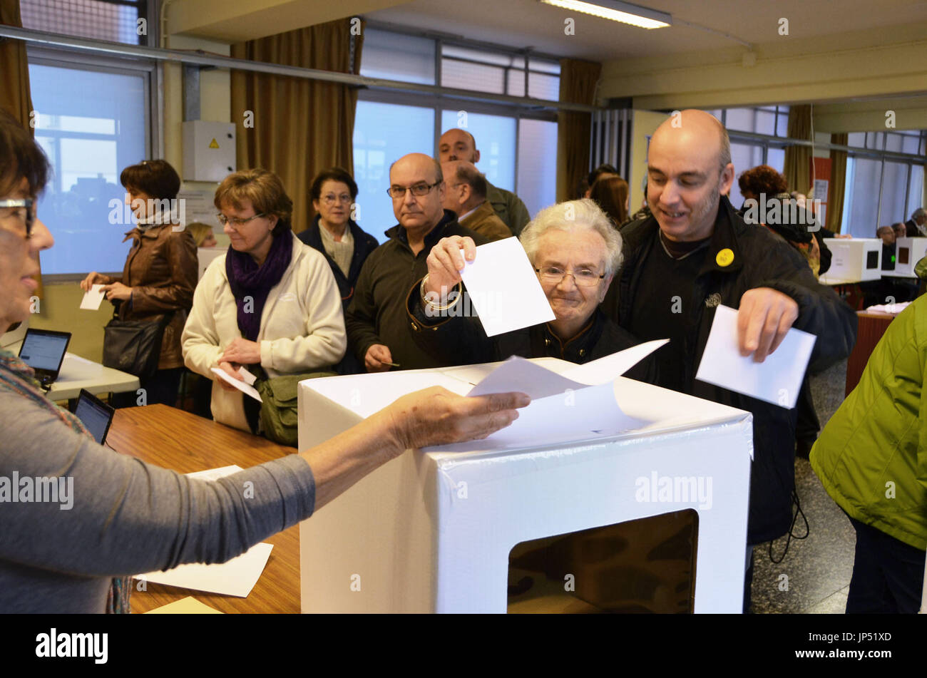 BARCELONA, Spain - People cast their ballots at a polling station in ...