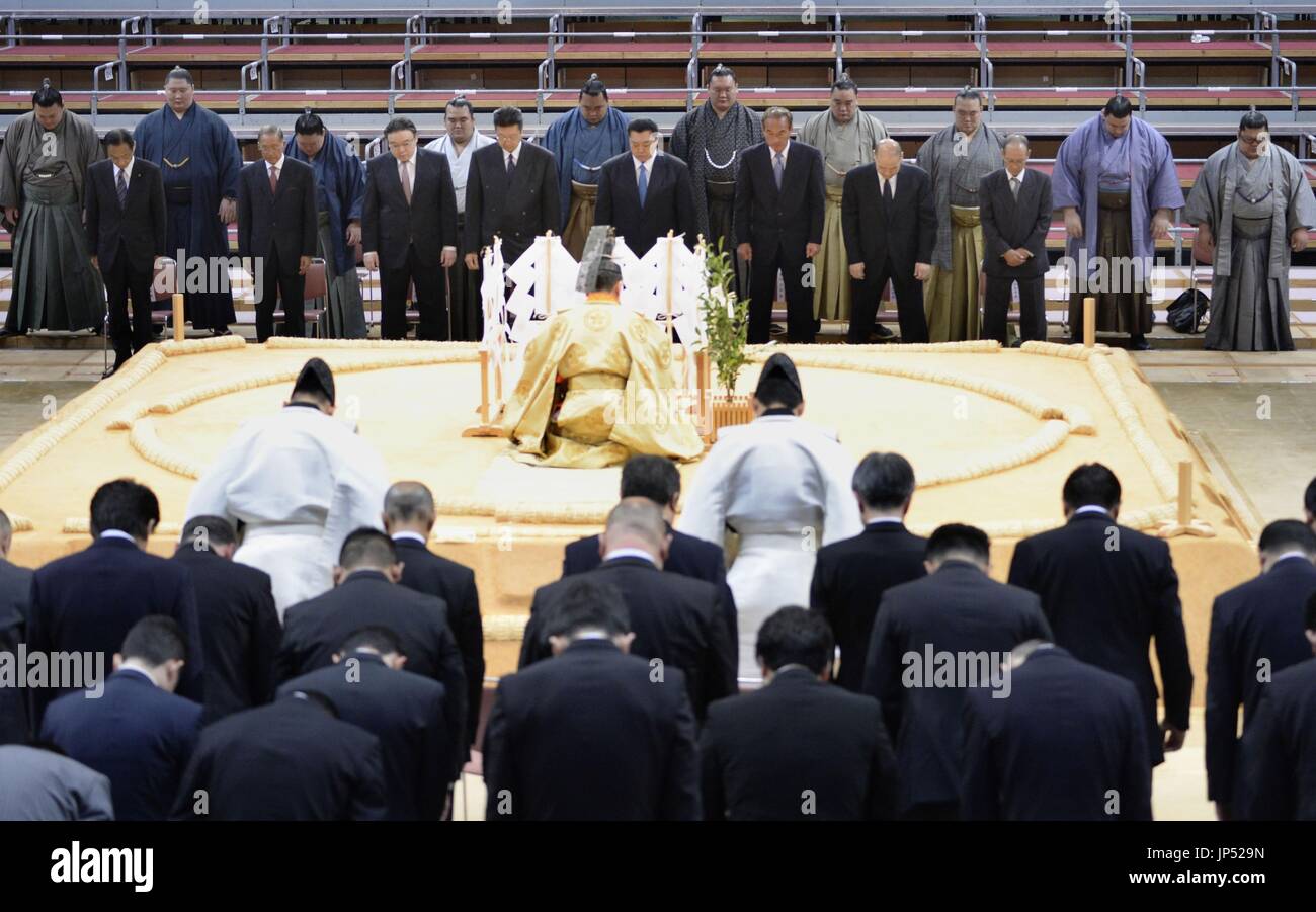 FUKUOKA, Japan - A ceremony is held at the "dohyo" ring in Fukuoka City ...