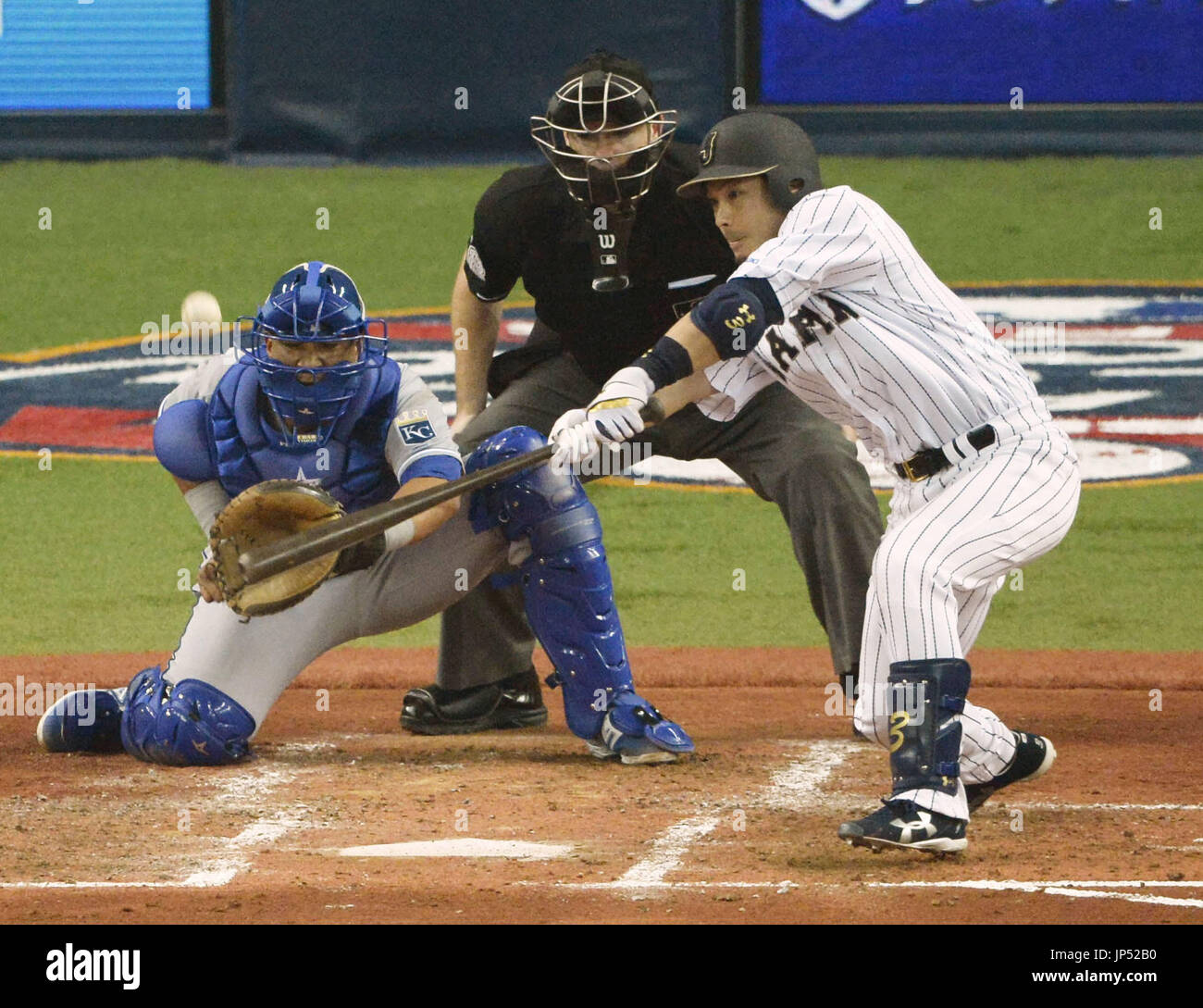 OSAKA, Japan - Samurai Japan's Nobuhiro Matsuda hits a sacrifice fly to ...