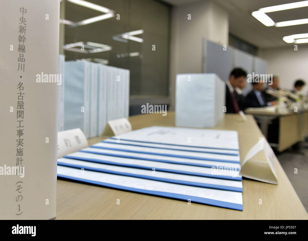 TOKYO, Japan - A set of documents is displayed at a press conference ...