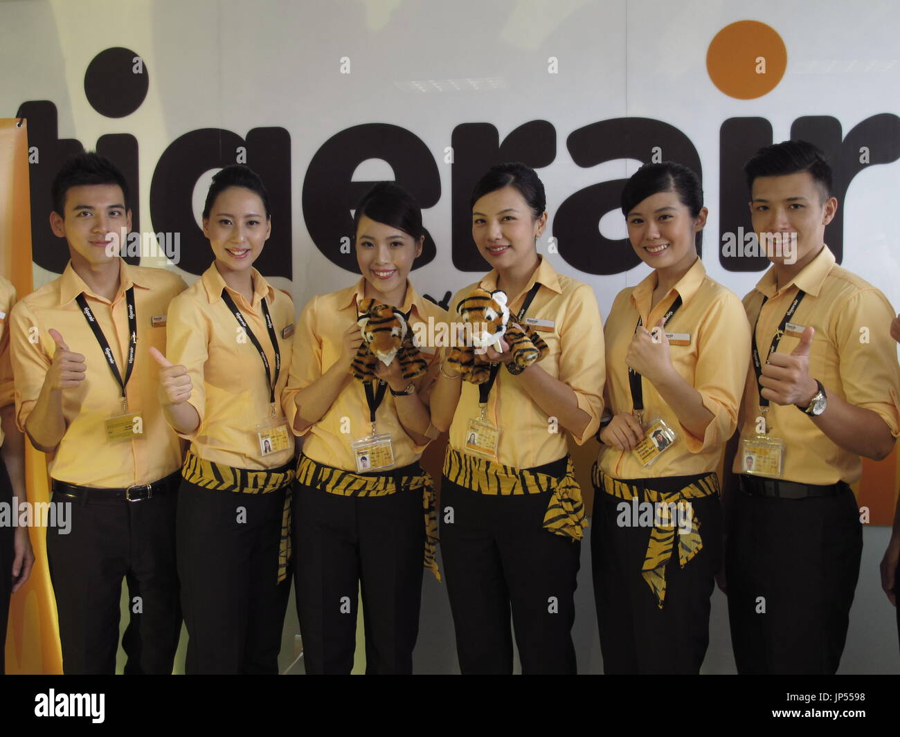 TAIPEI, Taiwan - Flight attendants of Tigerair Taiwan pose in Taipei on ...