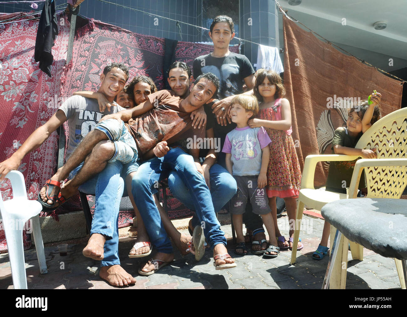 GAZA, Palestine Autonomous Area - Young Palestinians taking shelter in ...