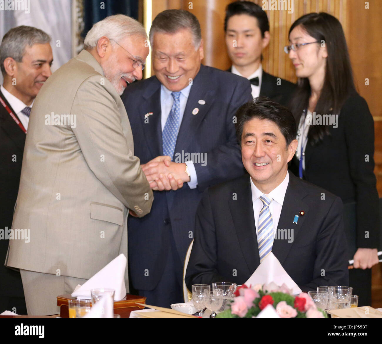 TOKYO, Japan - Indian Prime Minister Narendra Modi (2nd from L) shakes ...