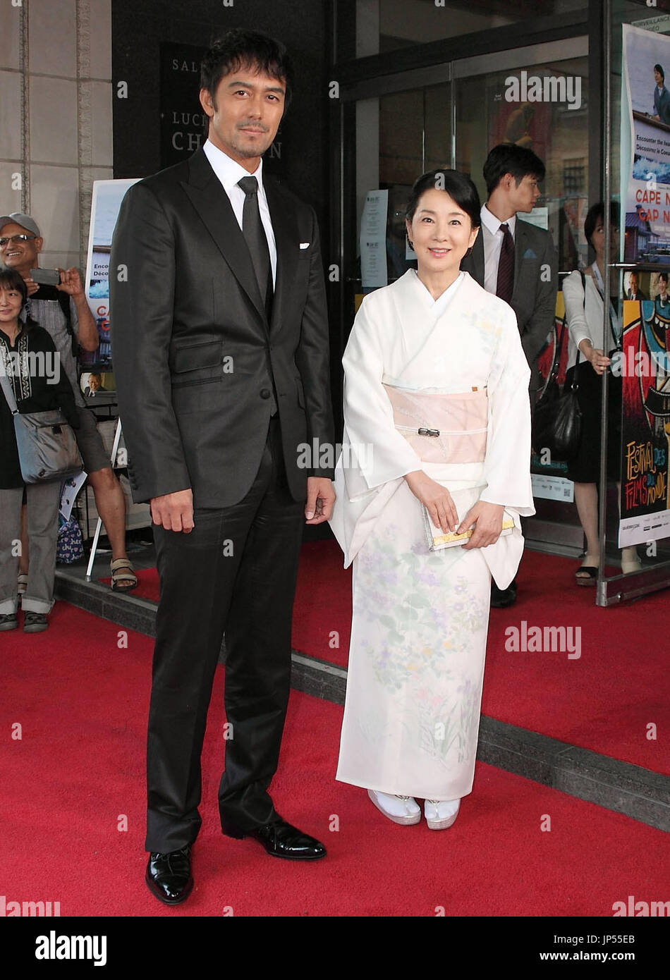 MONTREAL, Canada - Actress Sayuri Yoshinaga (R) and actor Hiroshi Abe ...