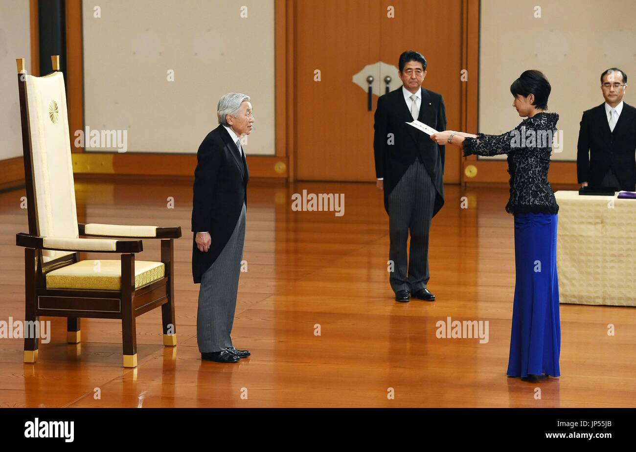 TOKYO, Japan - Yuko Obuchi (R) is attested as a Cabinet minister by ...
