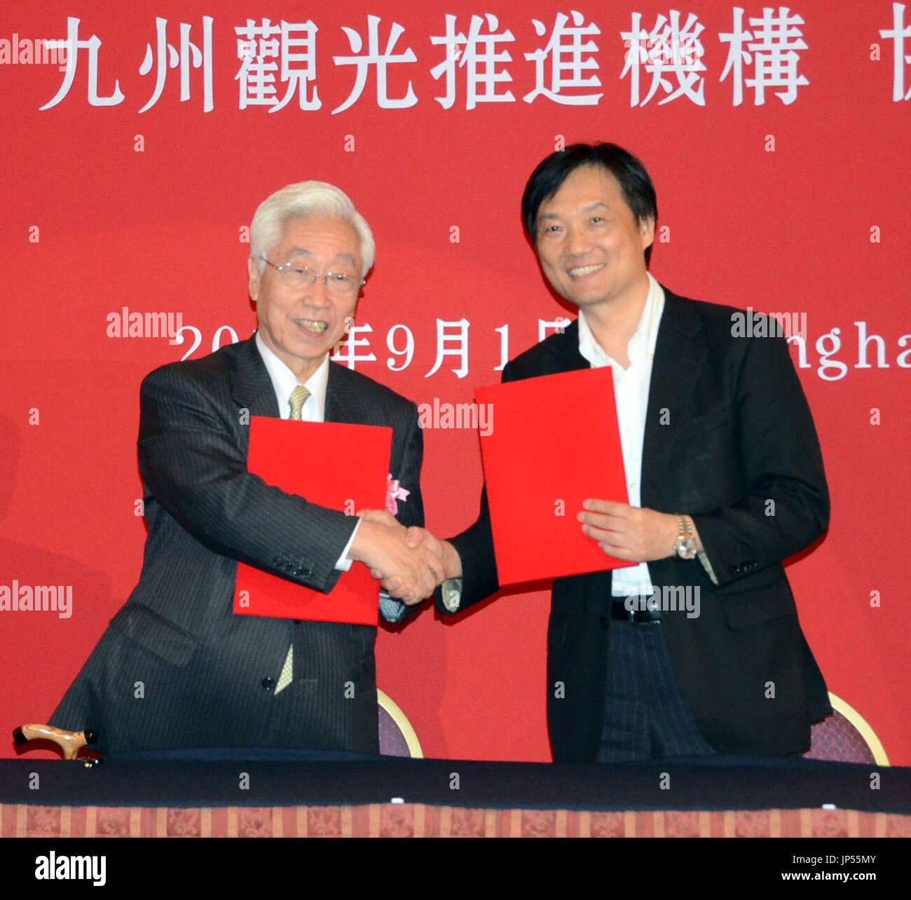 SHANGHAI, China - Susumu Ishihara (L), chairman of the Kyushu Tourism ...