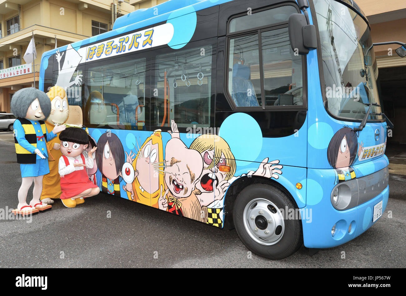 YONAGO, Japan - A bus decorated with the paintings of comic characters ...