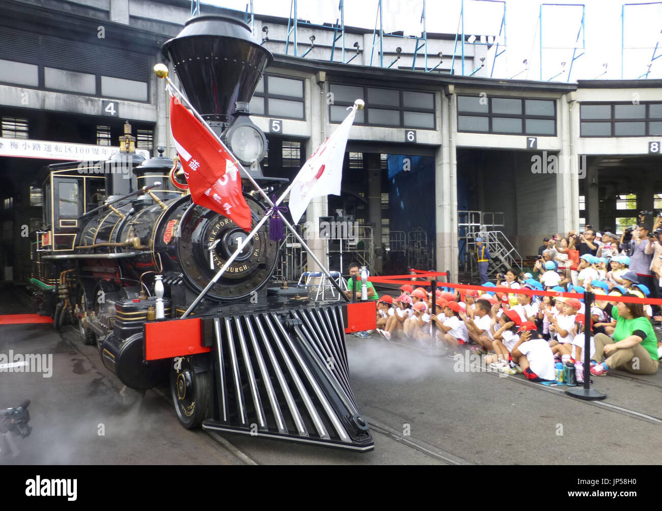 KYOTO, Japan - Amid cheering by kindergarten pupils, the Yoshitsune ...