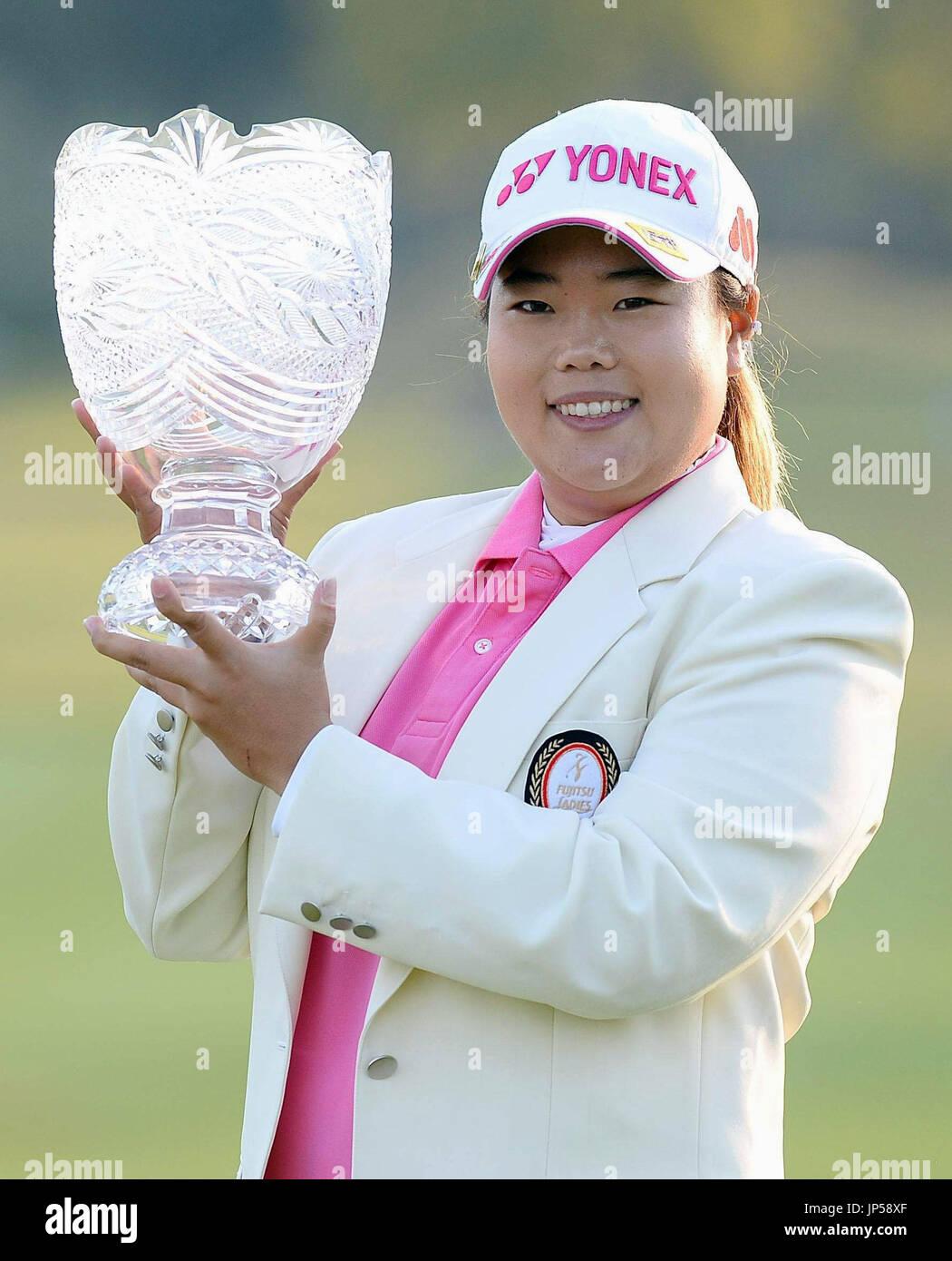 CHIBA, Japan - Ahn Sun Ju of South Korea poses with the winner's trophy ...