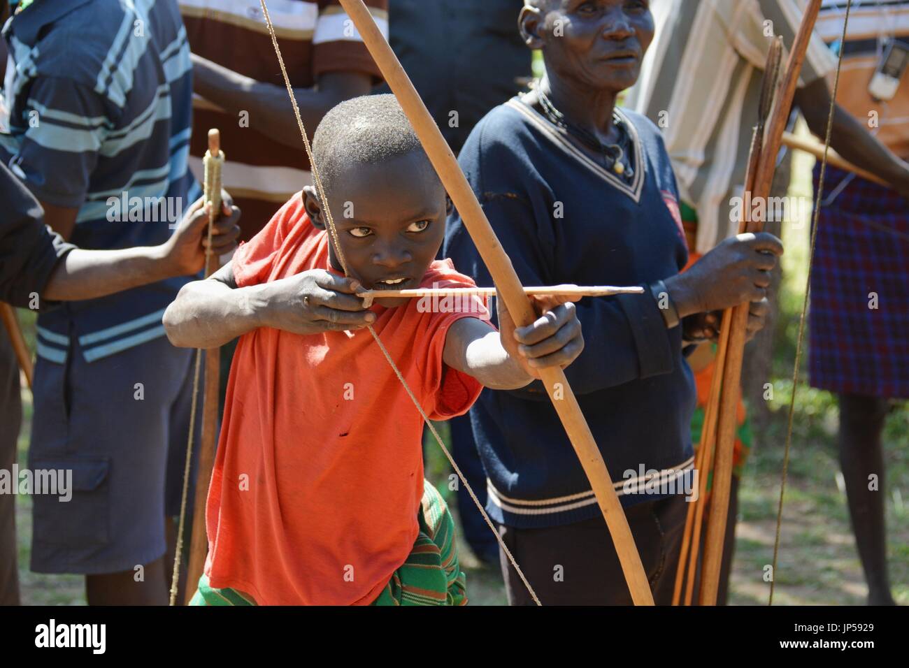 ALALE, Kenya - A boy of the Pokot tribe in Alale, Kenya, aims at a mark ...