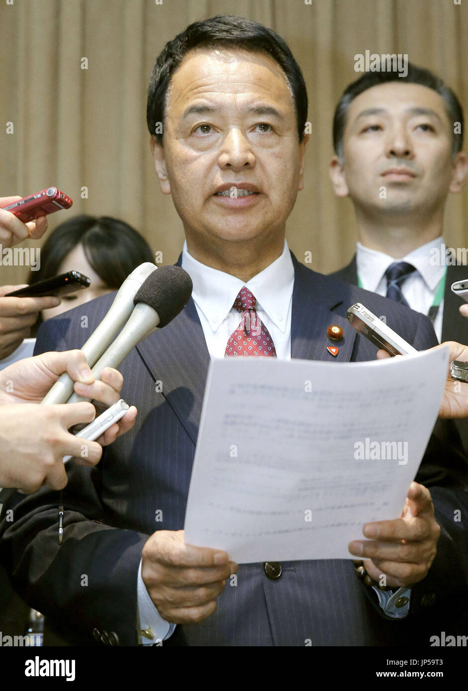 SYDNEY, Australia - Akira Amari, Japanese Cabinet minister in charge of ...