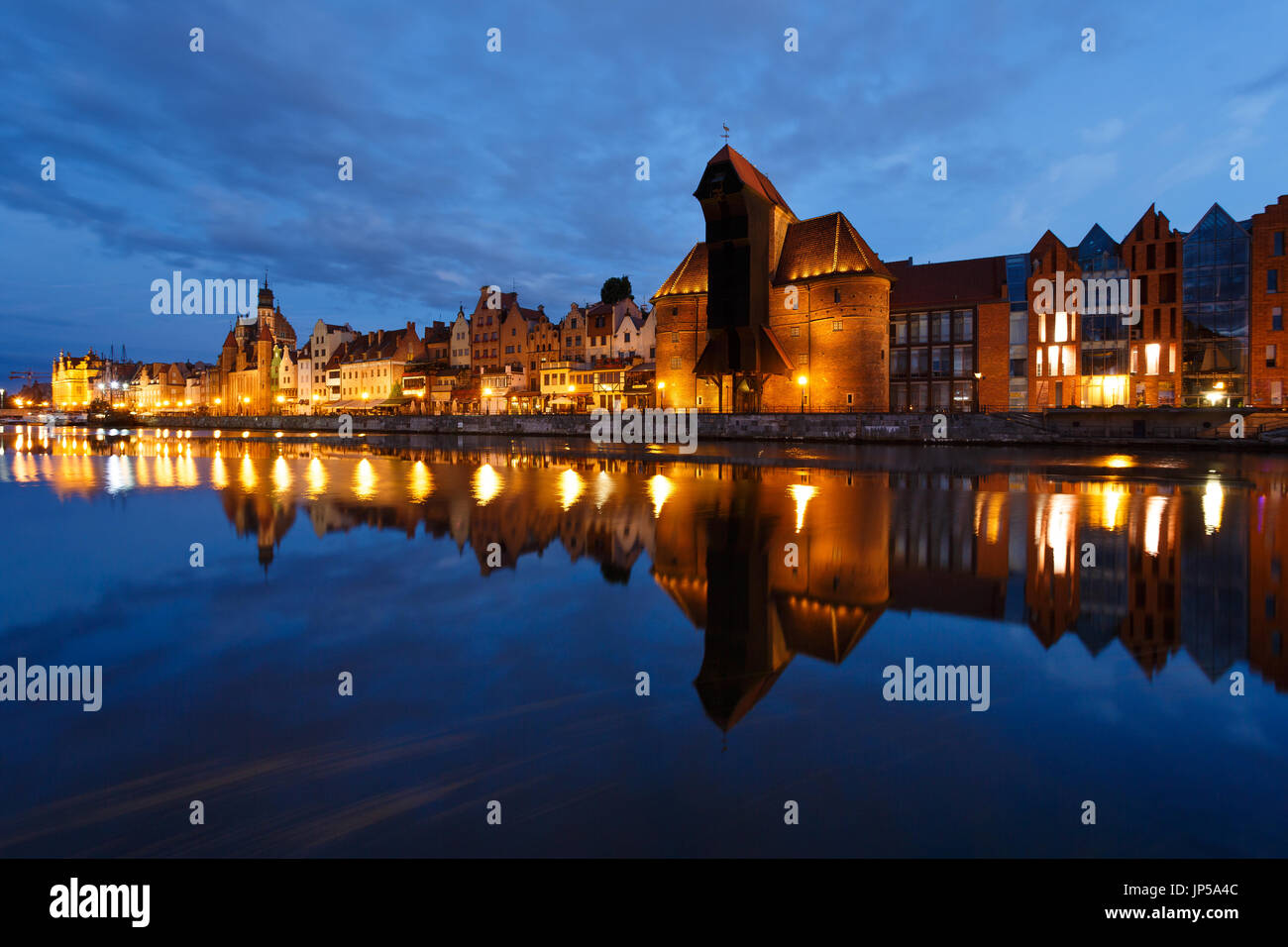 Buildings of the old town Gdansk reflected in a water in evening Stock ...