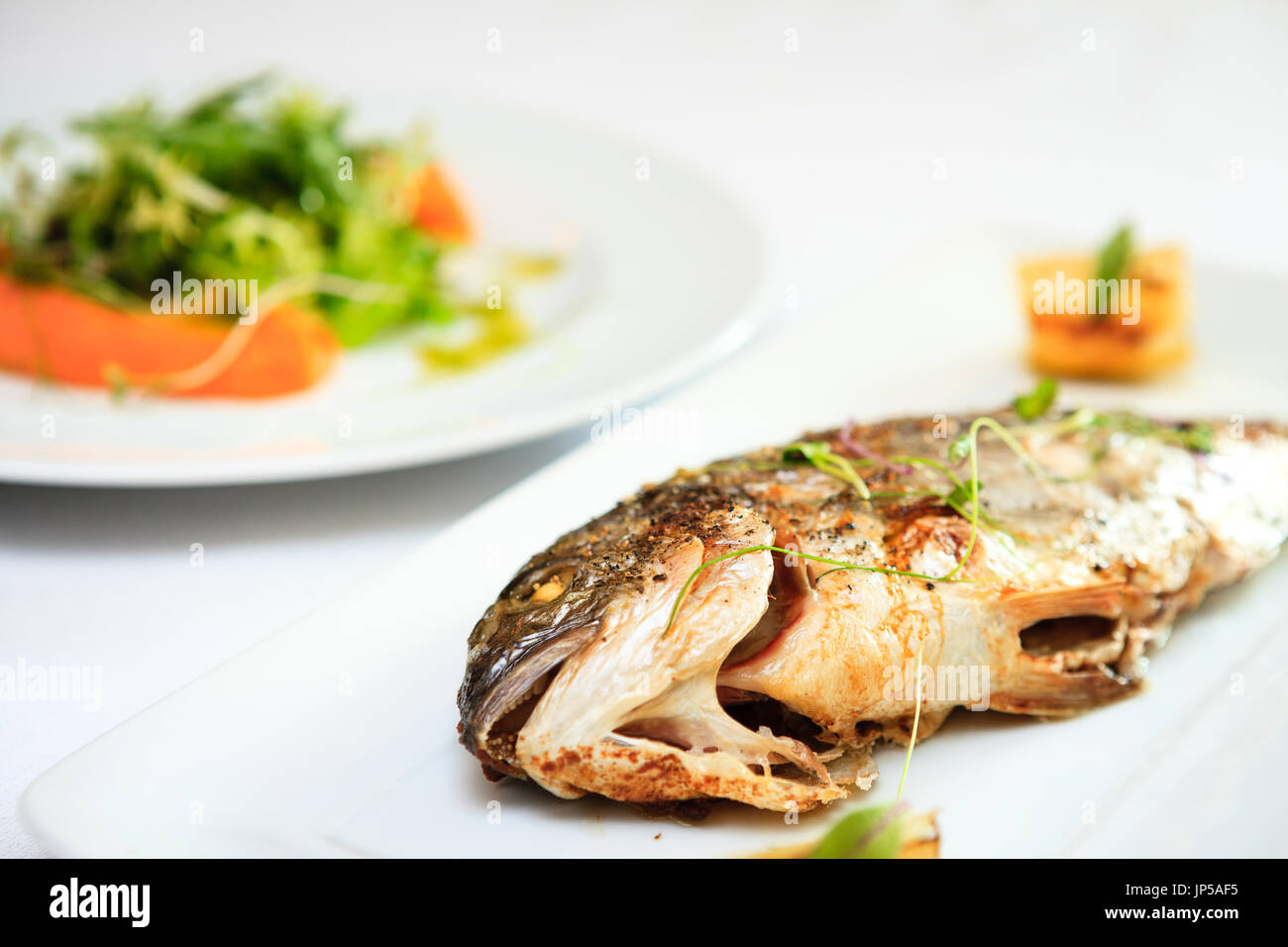Grilled dorada fish Stock Photo - Alamy