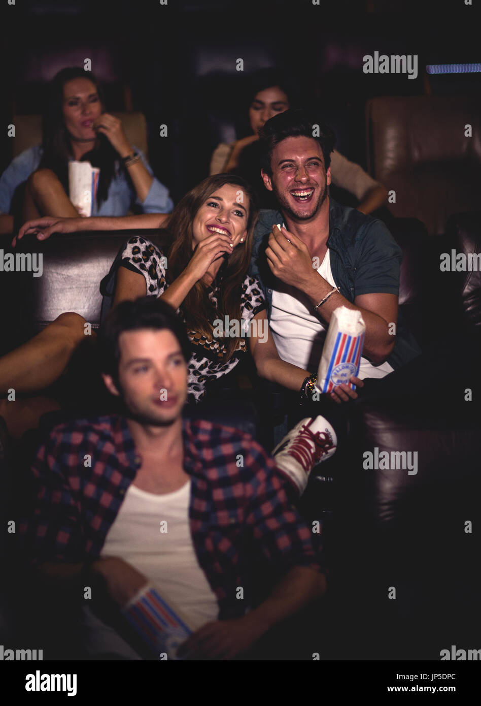 People in a cinema sitting hi-res stock photography and images - Alamy