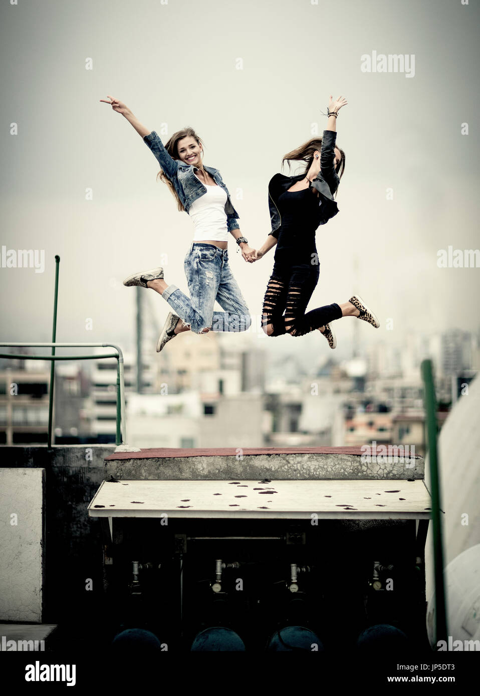 Jumping on roof hi-res stock photography and images - Alamy
