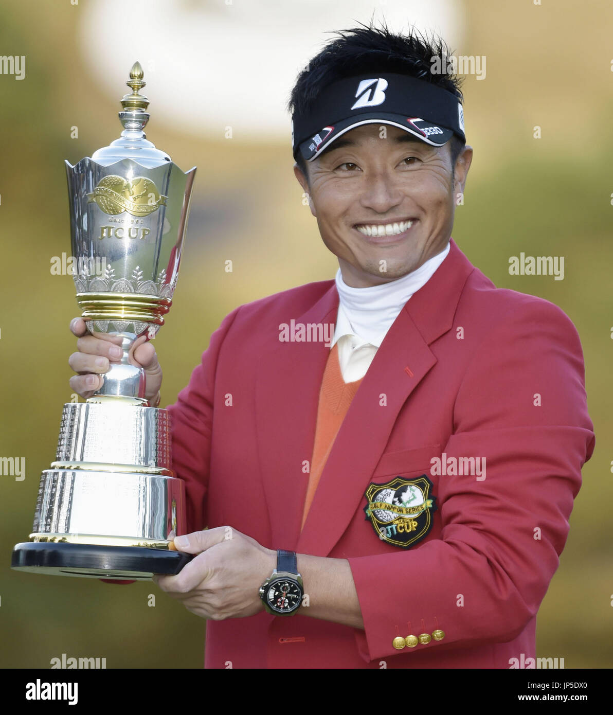 TOKYO, Japan - Japanese golfer Katsumasa Miyamoto is all smiles after ...