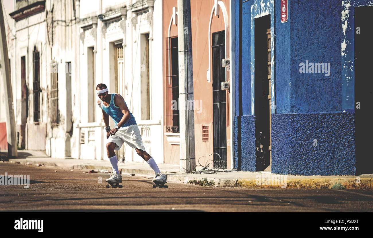A man rollerskating in a street Stock Photo - Alamy