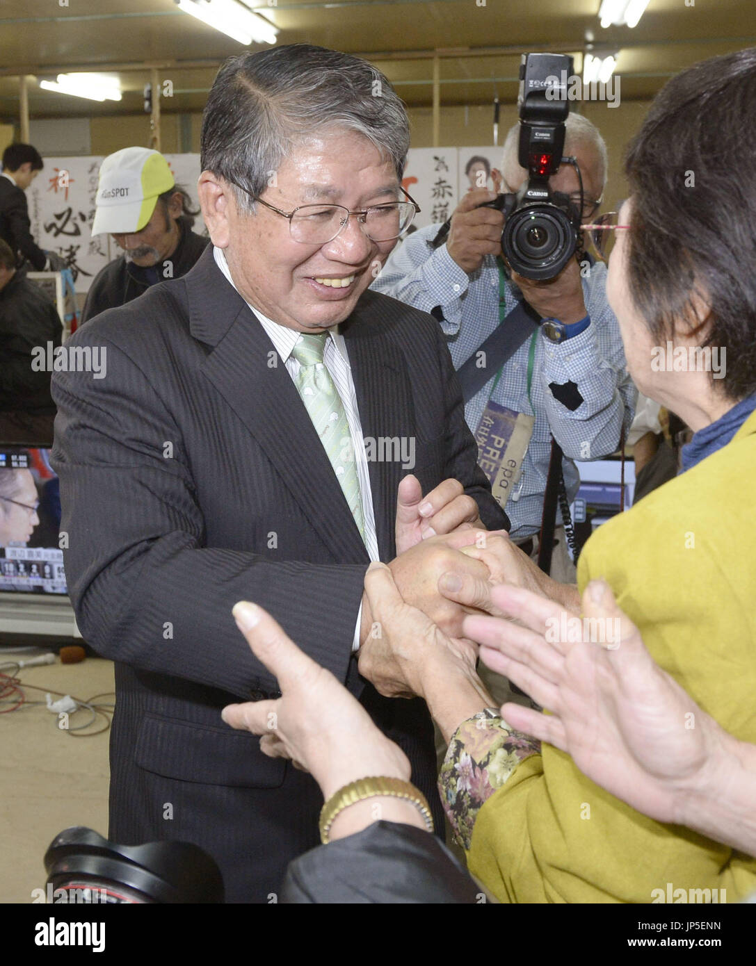 NAHA, Japan - Seiken Akamine, a candidate of the Japanese Communist ...