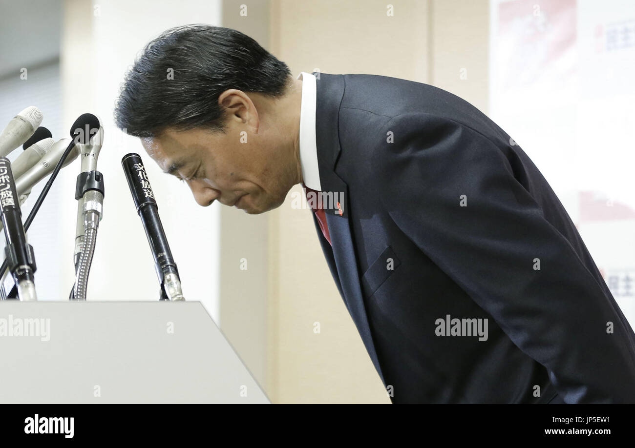 TOKYO, Japan - Opposition Democratic Party of Japan leader Banri Kaieda makes a bow to reporters ...