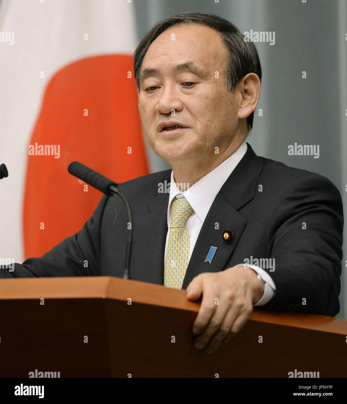 Chief Cabinet Secretary Yoshihide Suga attends a press conference at ...