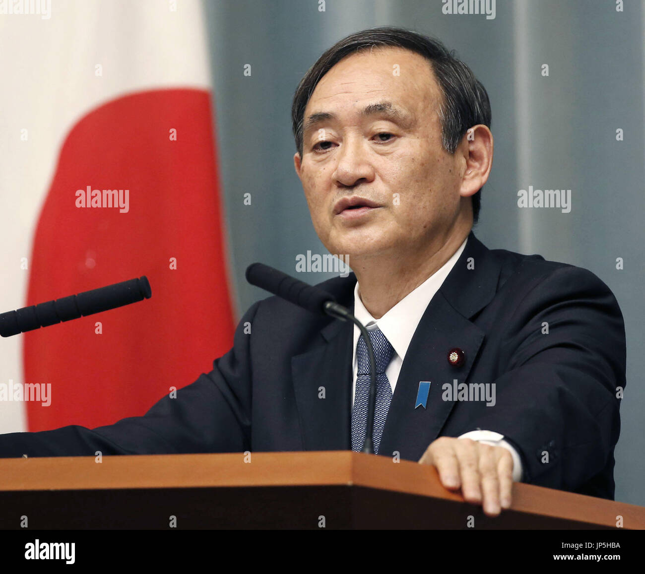 Japan's Chief Cabinet Secretary Yoshihide Suga speaks at a press ...