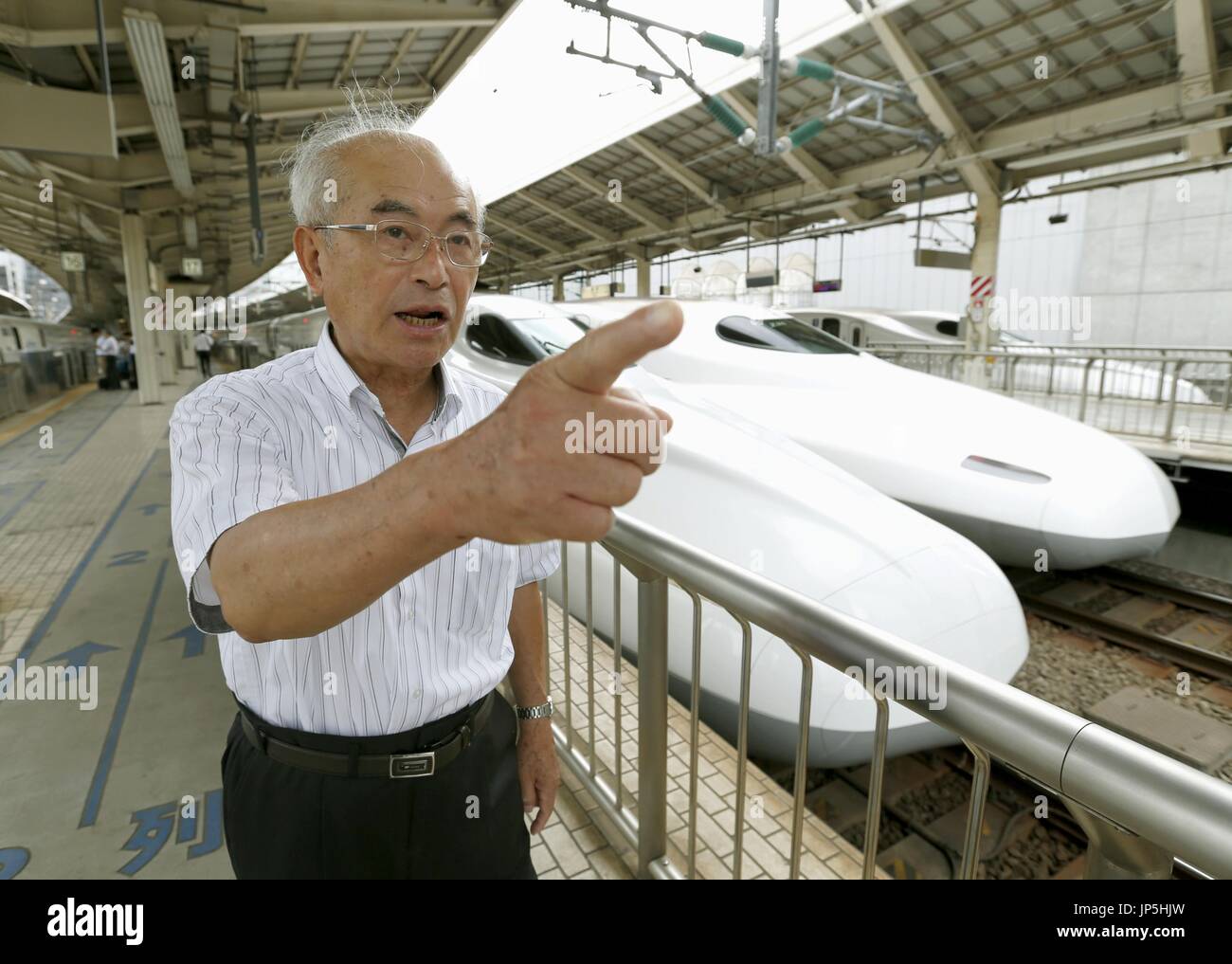 TOKYO, Japan - Kazutaro Oishi stands on platform No. 17 at JR Tokyo Station on Aug. 8, 2014 ...