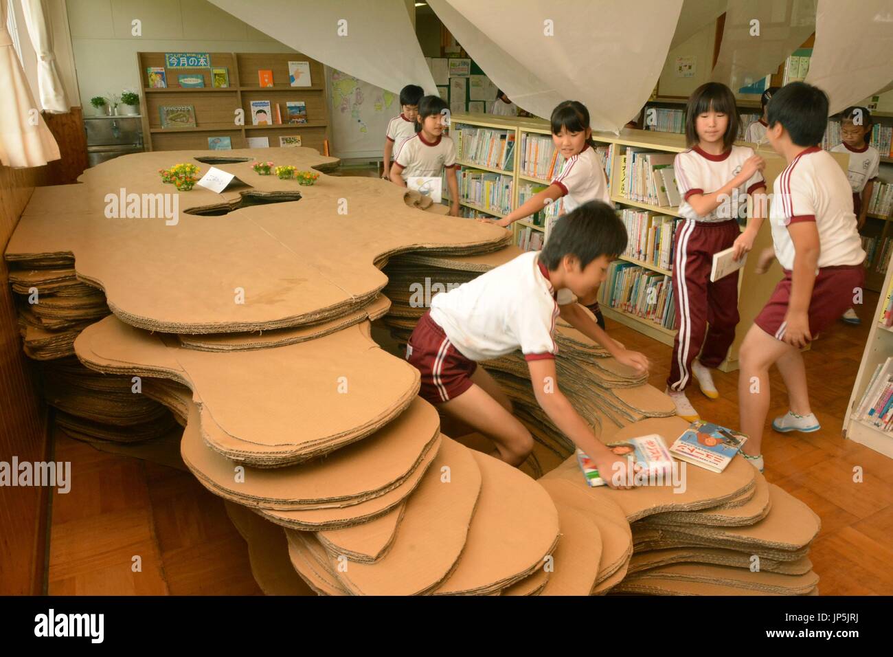 IWAKI, Japan - Pupils visit a uniquely refurbished library at Yoshima ...