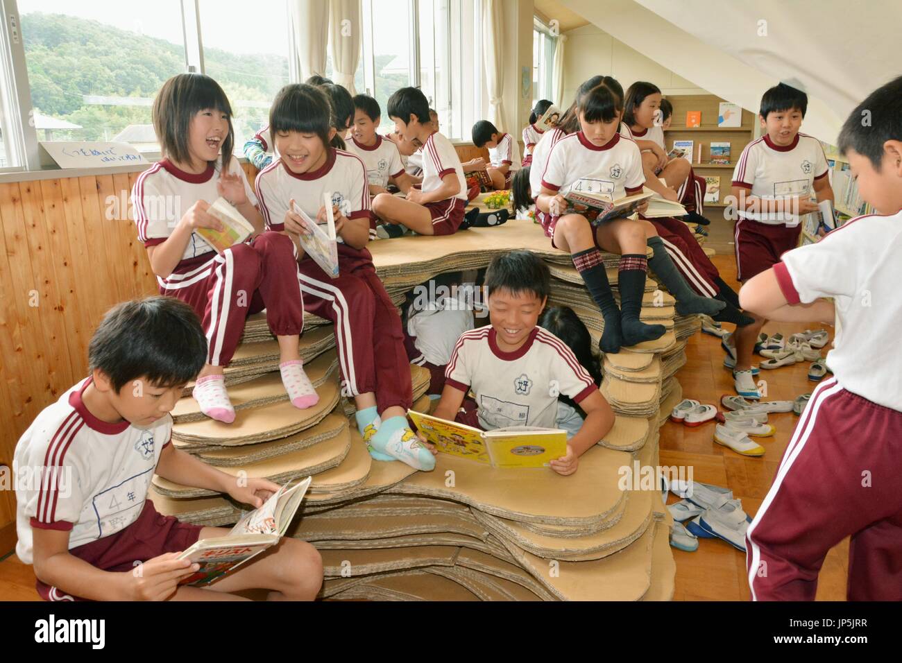 IWAKI, Japan - Pupils enjoy reading books in a uniquely refurbished ...