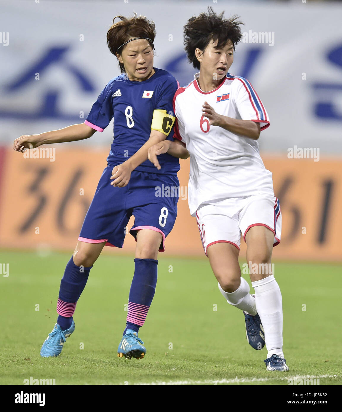 INCHEON, South Korea - Japan captain Aya Miyama (L) scores for Japan in ...