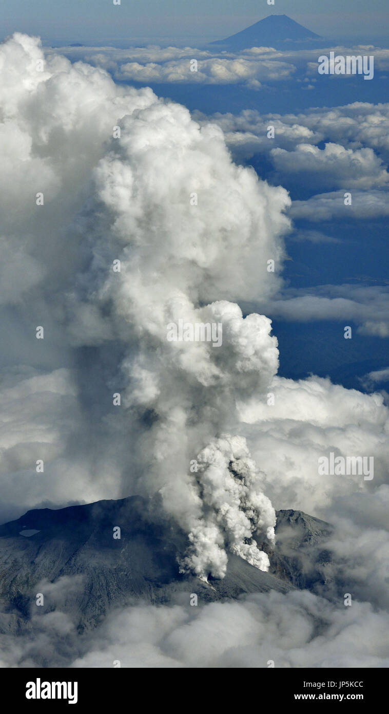 TOKYO, Japan - Photo taken from a Kyodo News airplane shows columns of ...