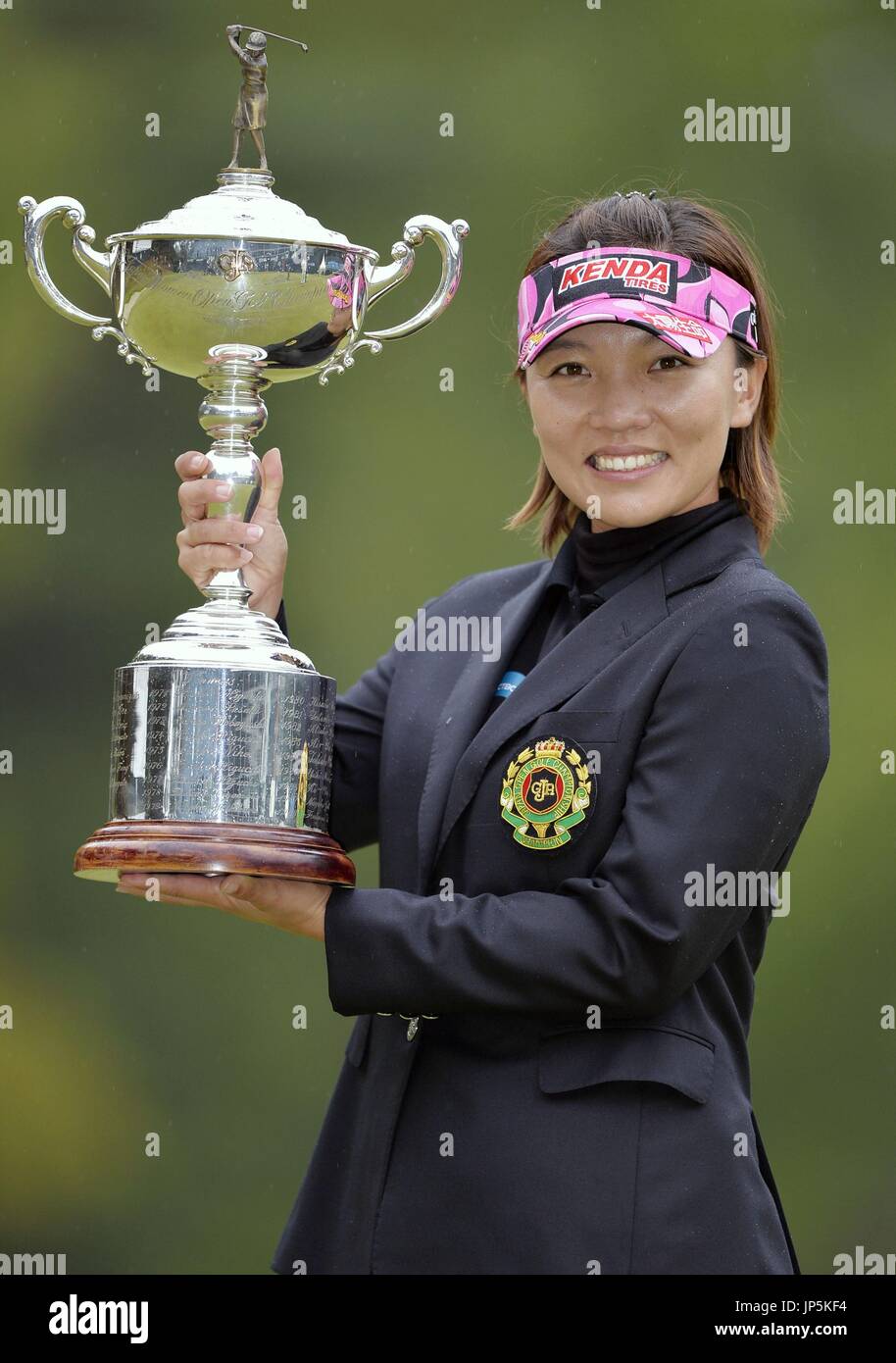 RITTO, Japan - Teresa Lu of Taiwan poses with the winner's trophy after ...