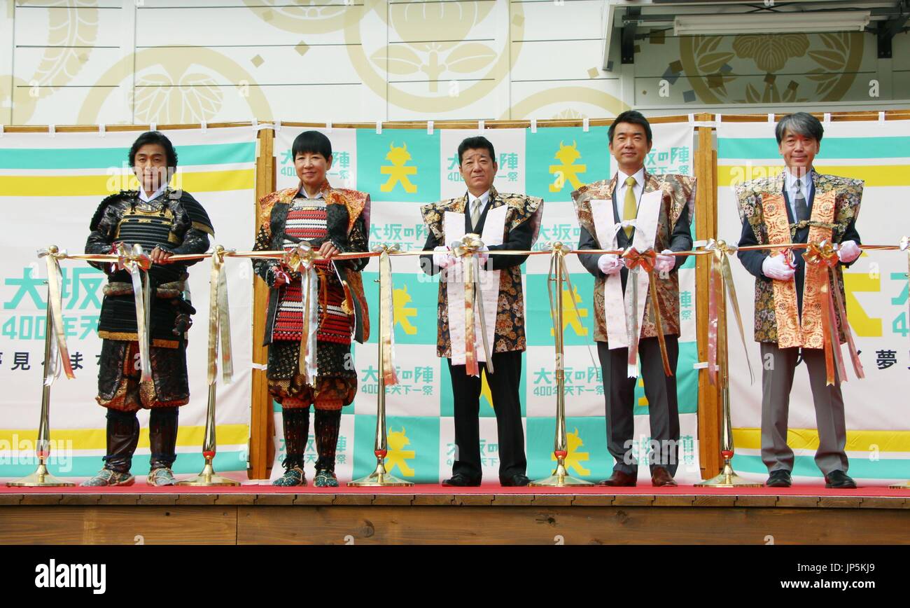 OSAKA, Japan - Celebrities in traditional armor suits cut the ribbon to ...