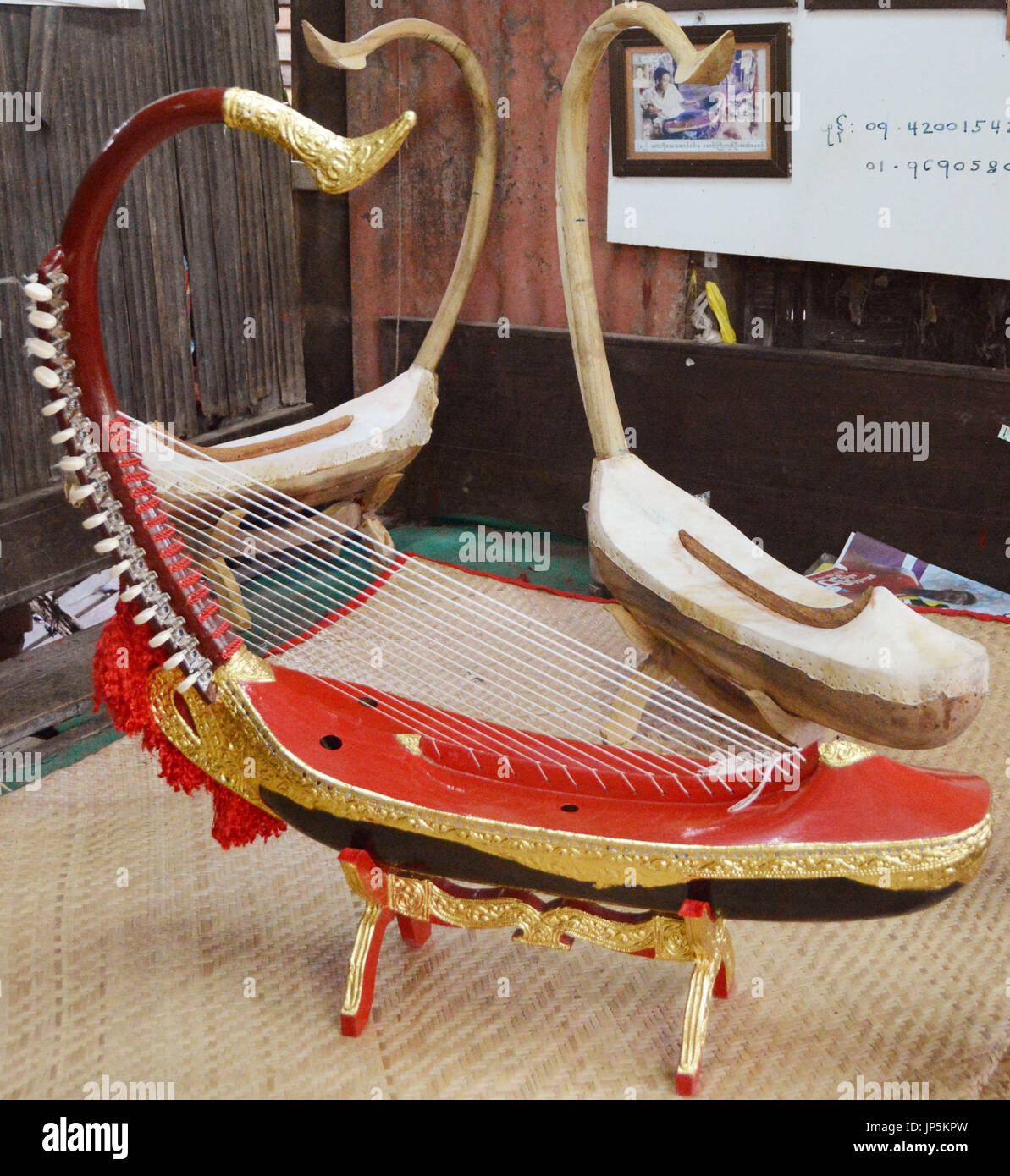 YANGON, Myanmar - Saung-gauk, traditional Burmese harps, made by a ...