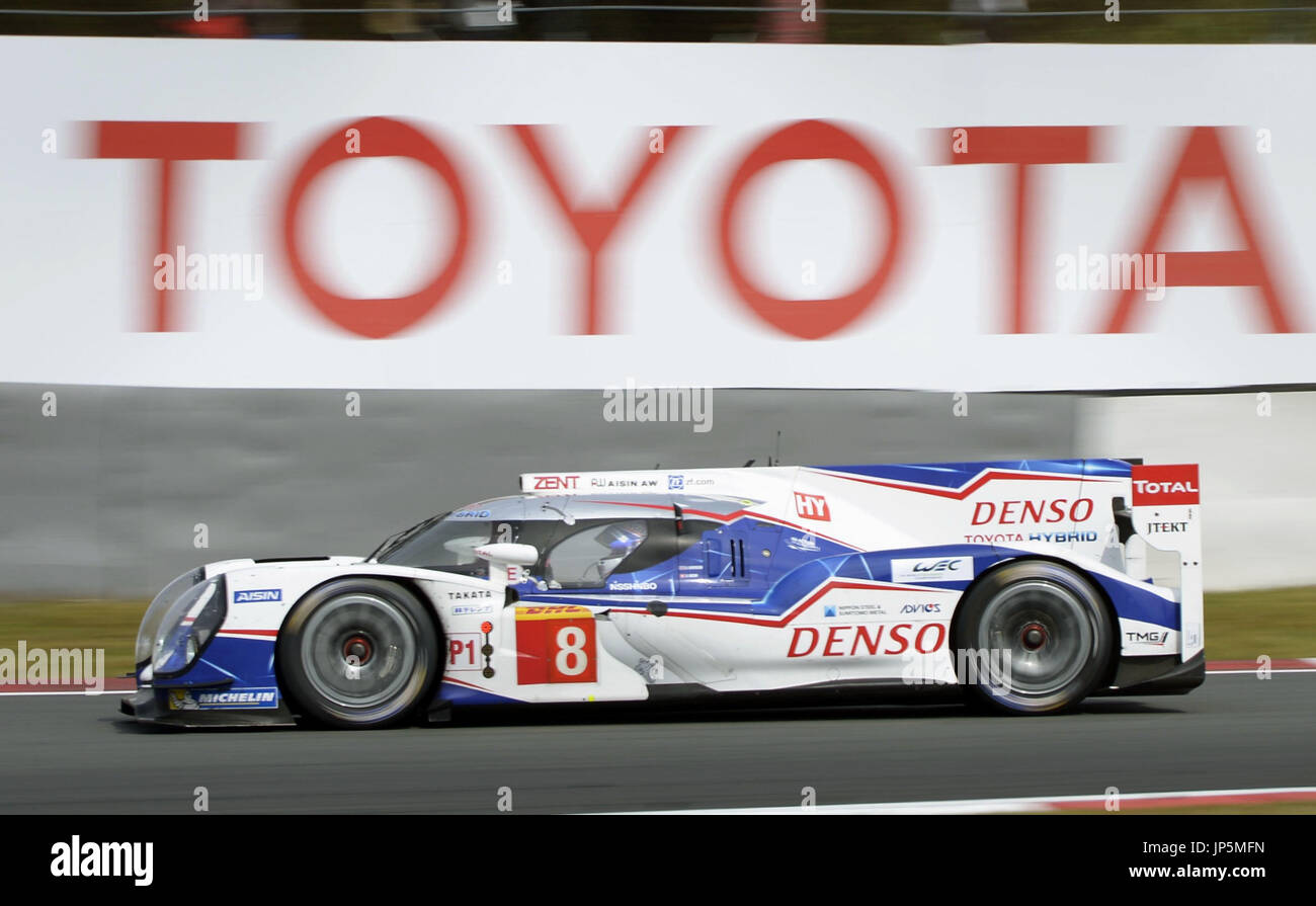 OYAMA, Japan - Toyota Racing's hybrid racing car competes in the FIA ...