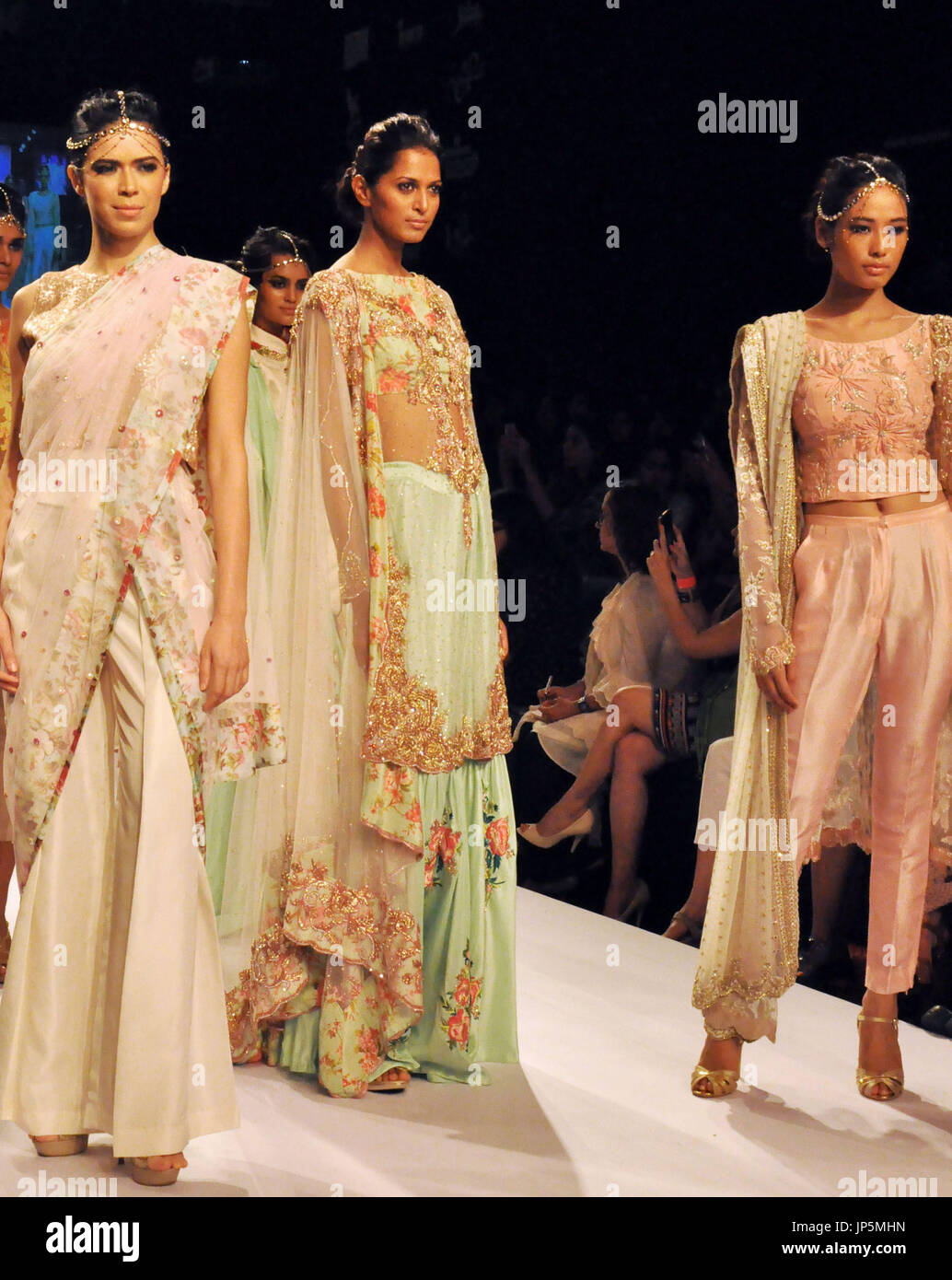 MUMBAI, India - Models pose during a fashion show held by Pakistani ...