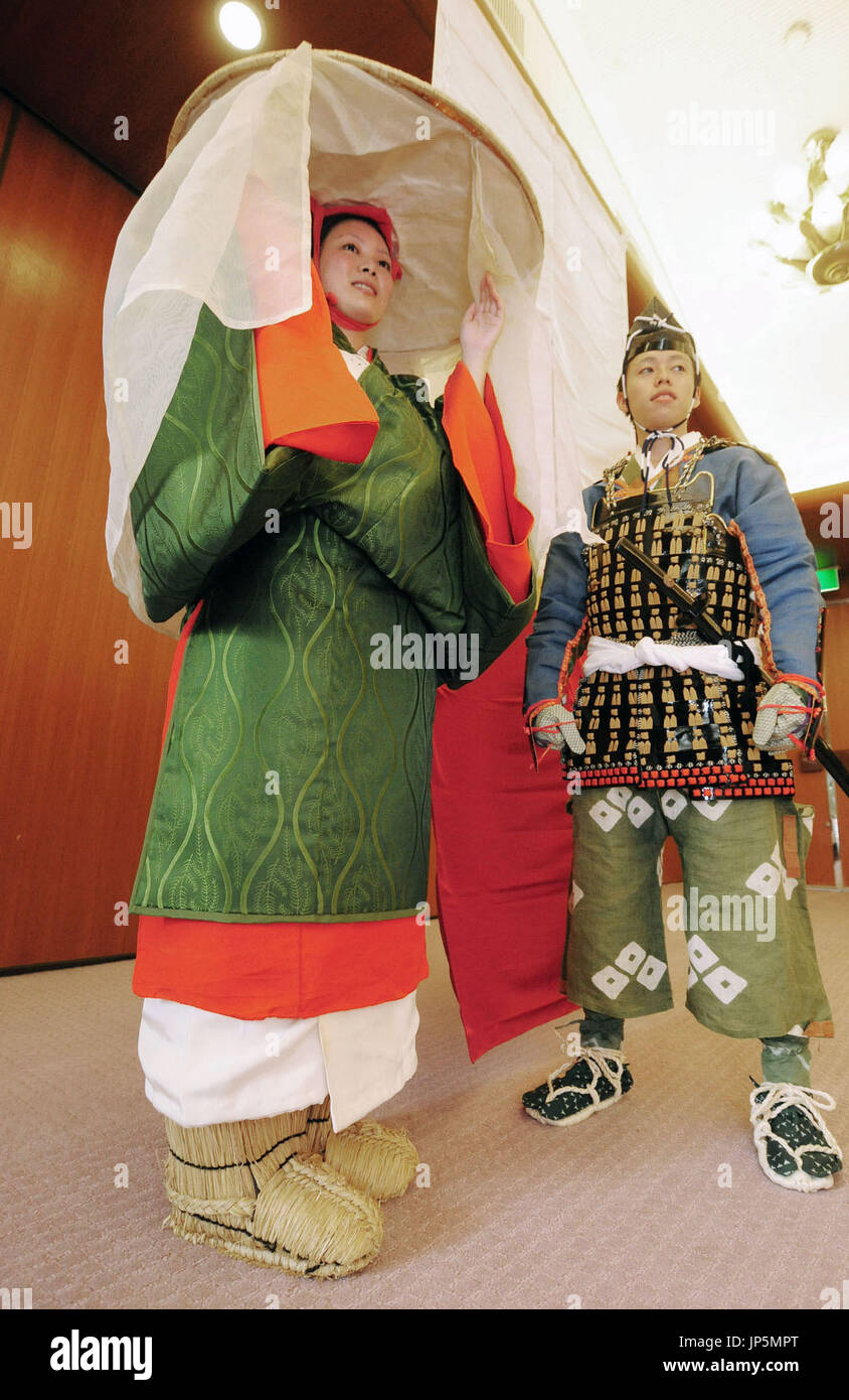 KYOTO, Japan - The new outer garment (L) put on top of "Tokiwa Gozen ...