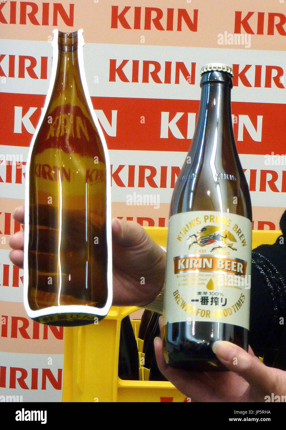 TOKYO, Japan - Kirin Brewery Co. unveils a 20% less heavy 500-ml glass beer bottle, Japan's ...