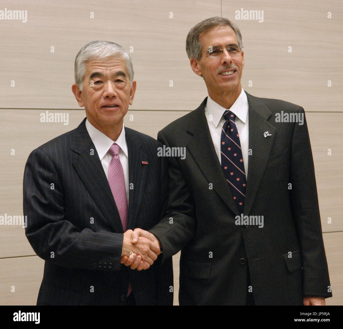 TOKYO, Japan - Akihiro Nikkaku (L), president of Toray Industries Inc ...